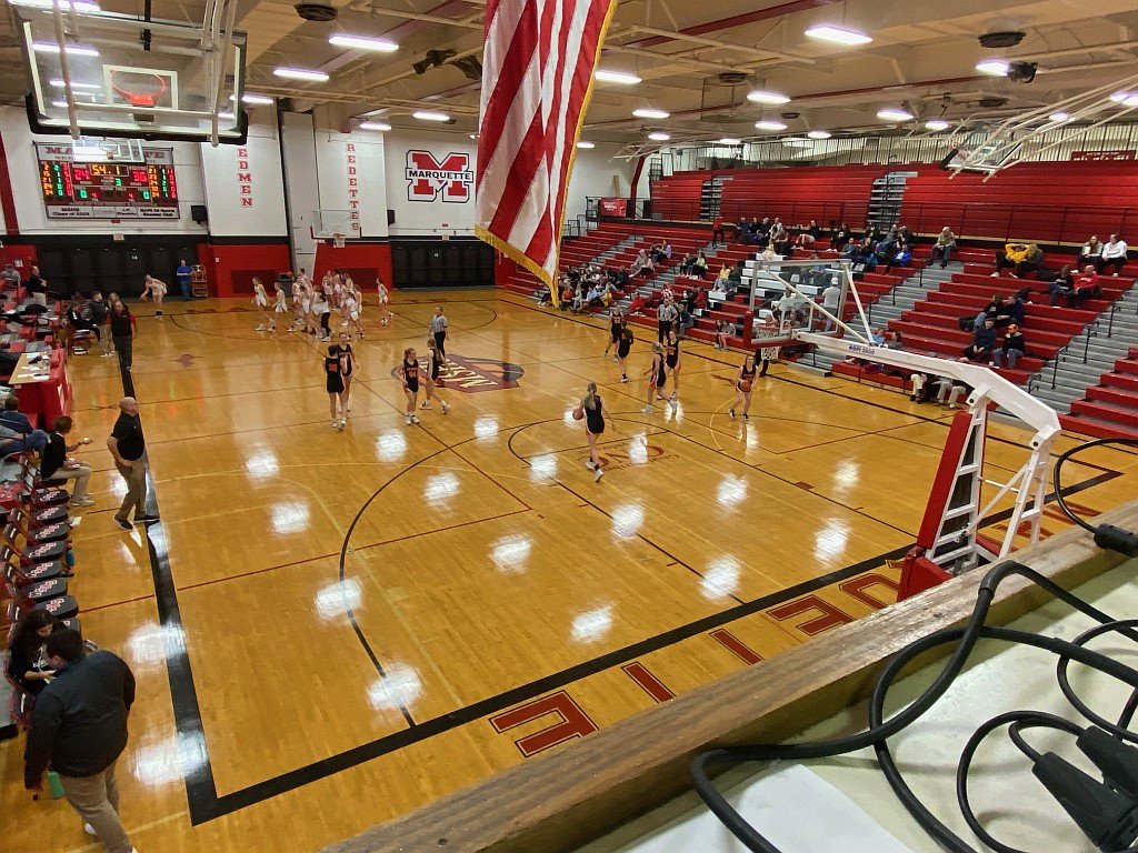 Escanaba Eskymos defeat Marquette Redettes Basketball 65-48